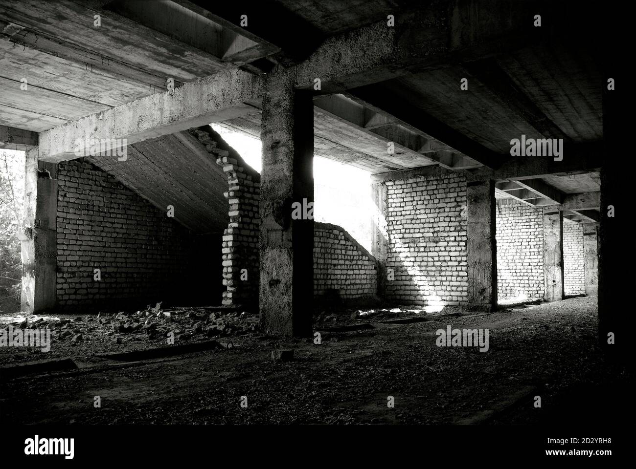 Unfinished and abandoned concrete and brick building. Unfinished ...