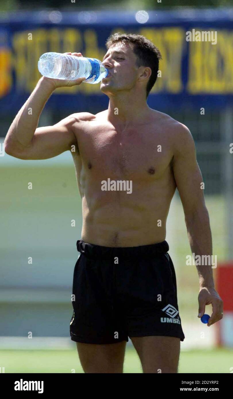 Scotland's John Collins takes some refreshment as the squad practice in ...