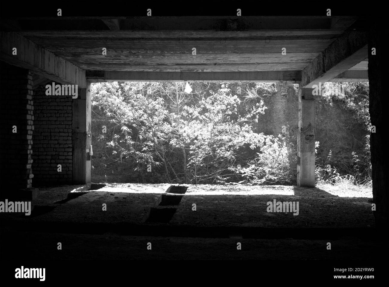 Unfinished and abandoned concrete and brick building. Unfinished ...