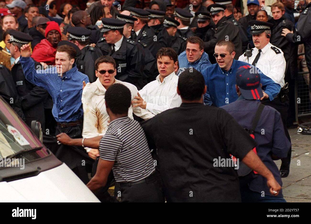 CORRECTED VERSION Three of the five murder suspects David Norris, (left ...