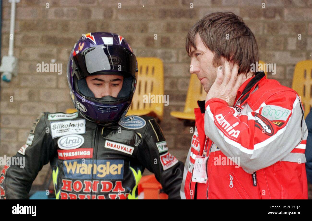 Former Motorcyling Champion Ron Haslam talks to his son Leon before his ...