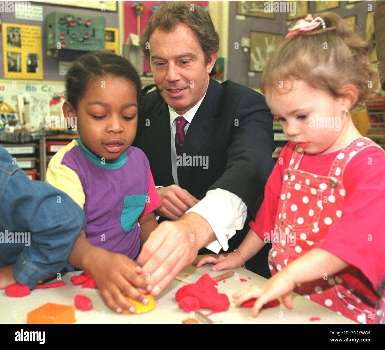 British Prime Minister Tony Blair gets involved on the modeling table ...