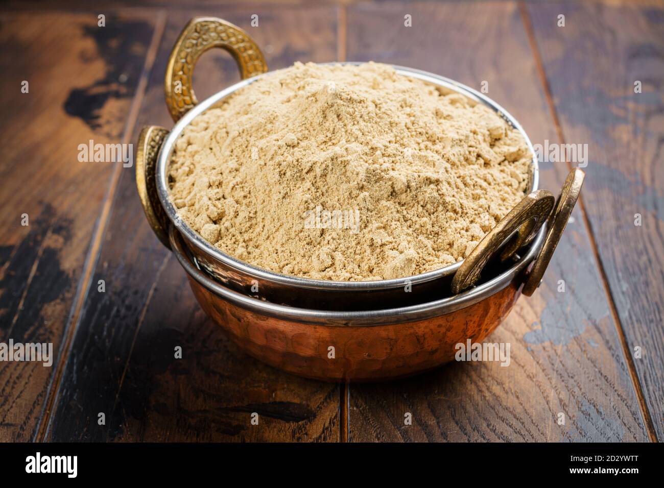 Fresh ground ginger powder Stock Photo - Alamy