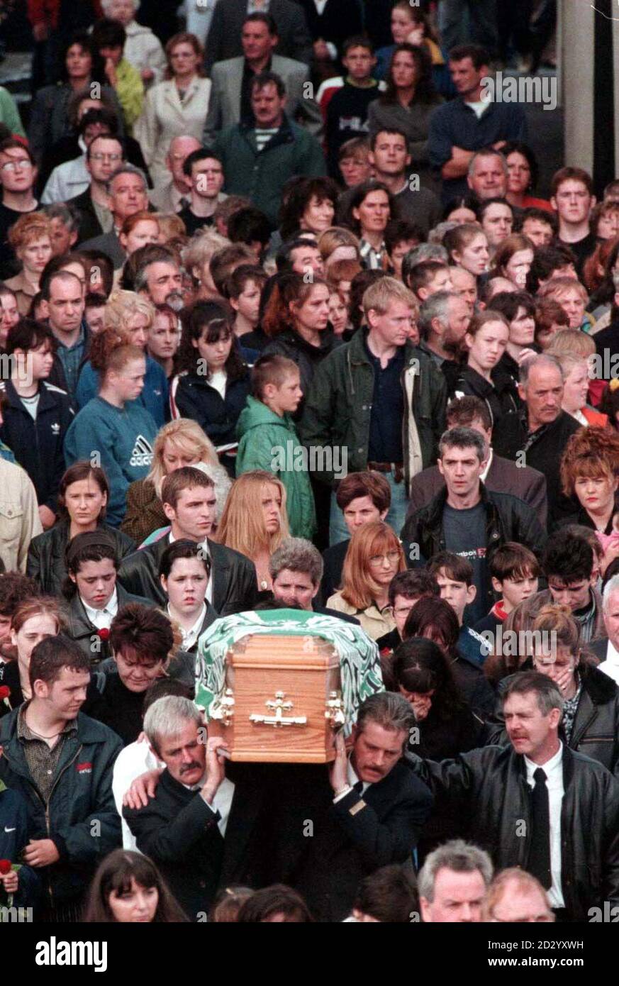 The coffin of Oran Doherty (8), enters the cemetery in Buncrana, Co ...
