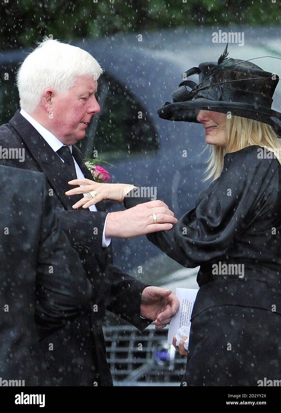 Karen Edwards and her husband Charlie Edwards following the funeral of ...