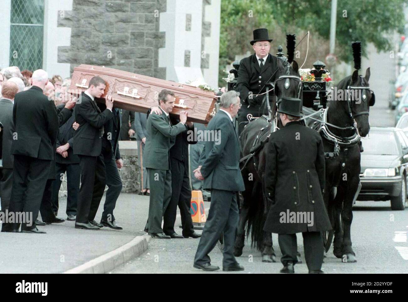 The coffin of Sean McGrath, the 29th victim of the Omagh bomb leaves St ...