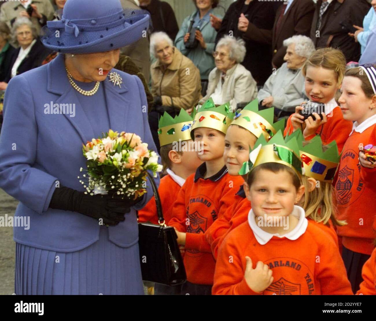The Queen surrounded by Kings from Tarland Primary School, during her ...