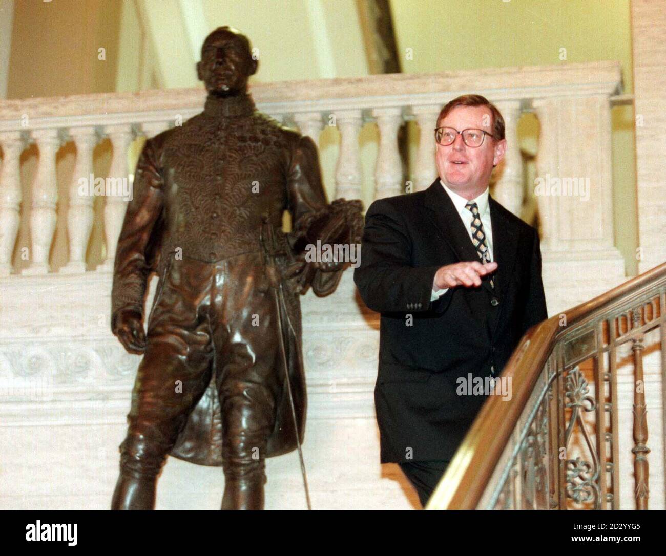 First Minister, David Trimble beside a statue of Lord Craigavon the ...