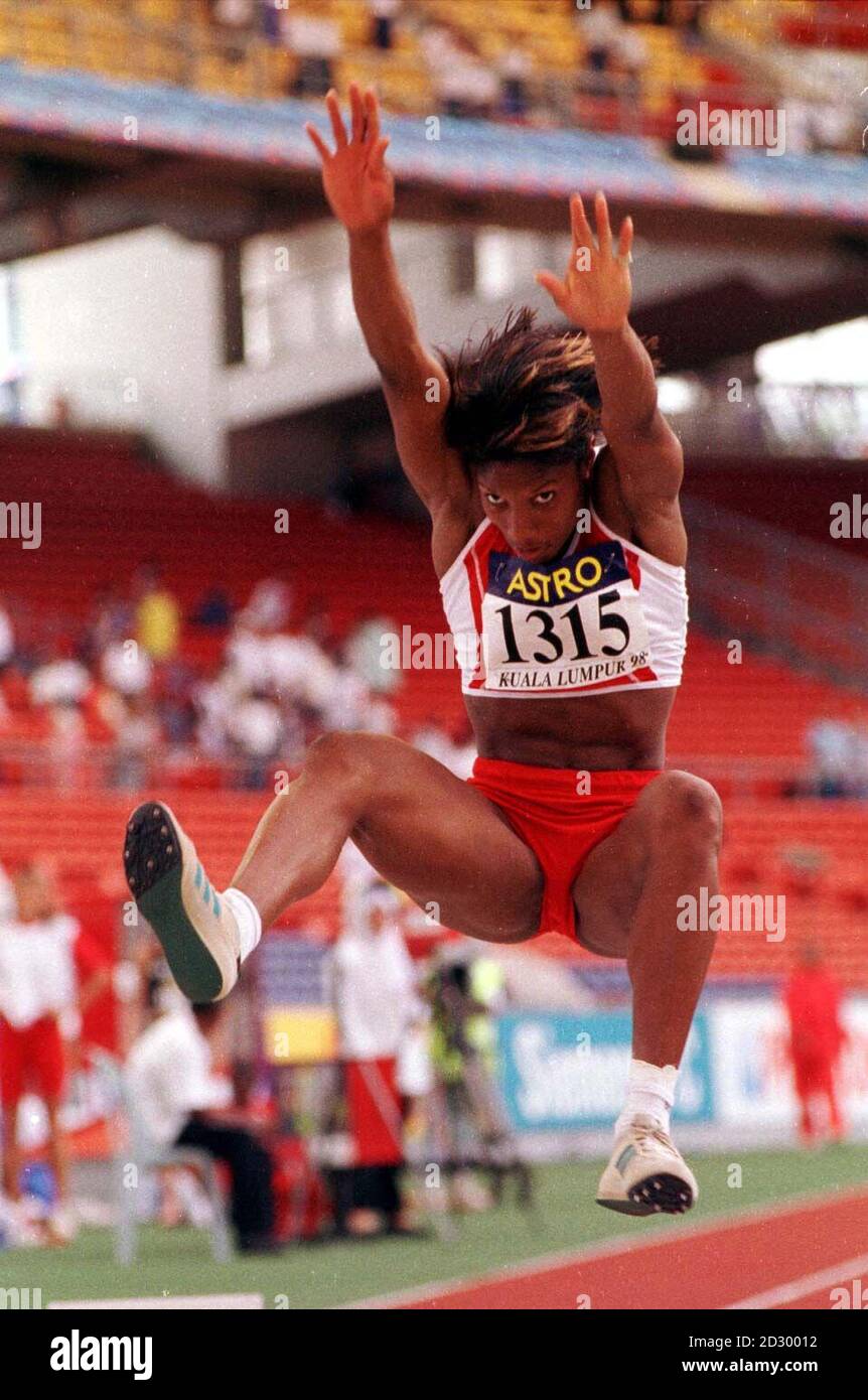 Heptathlete Denise Lewis competes in the long jump on the second and ...