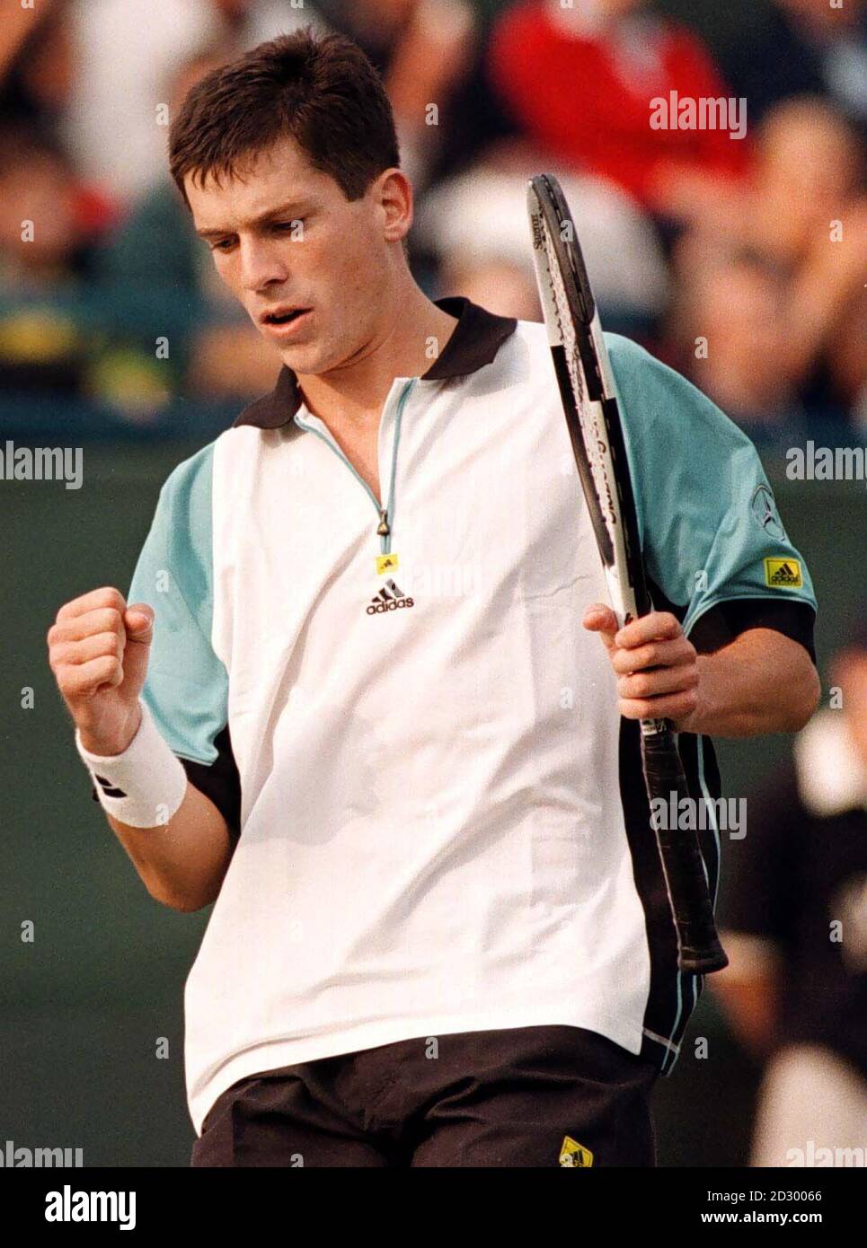 Tim Henman celebrates a point against Mahesh Bhupathi during the Davis ...