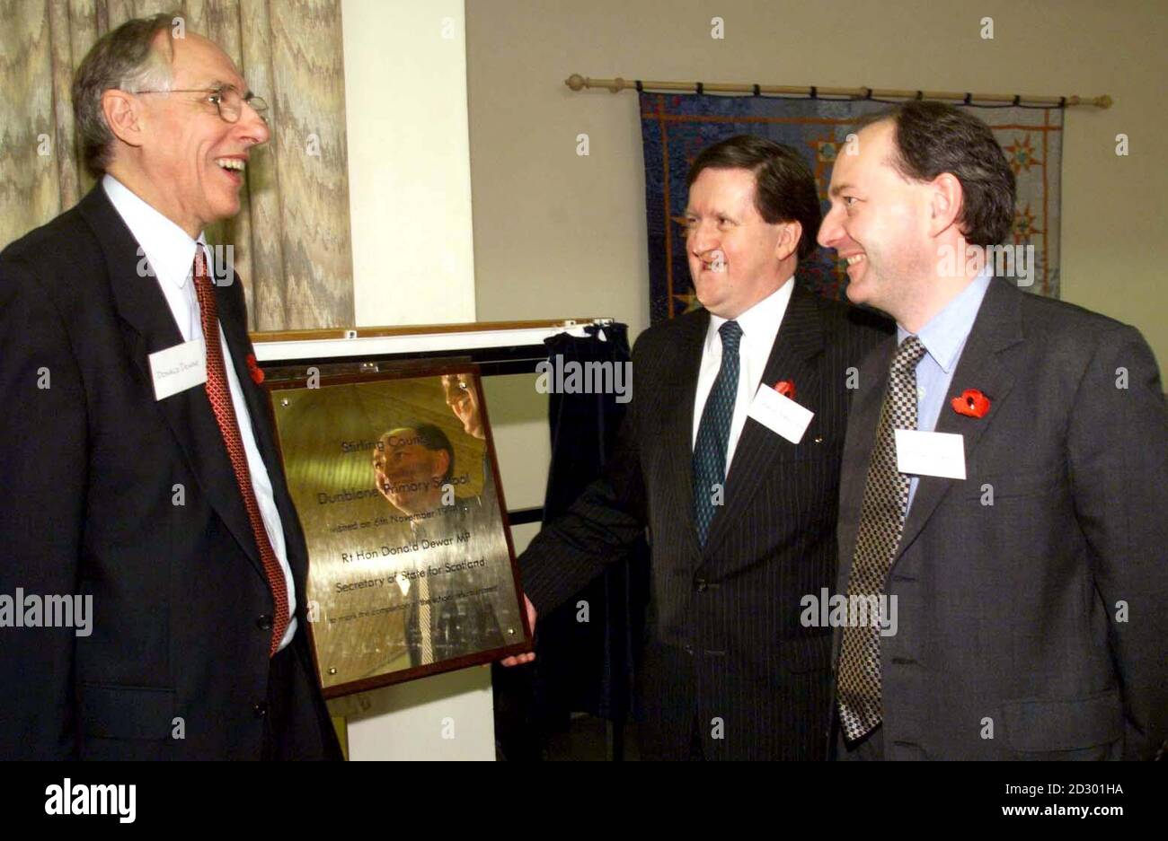 Scottish Secretary Donald Dewar (left) with Defence Secretary George ...
