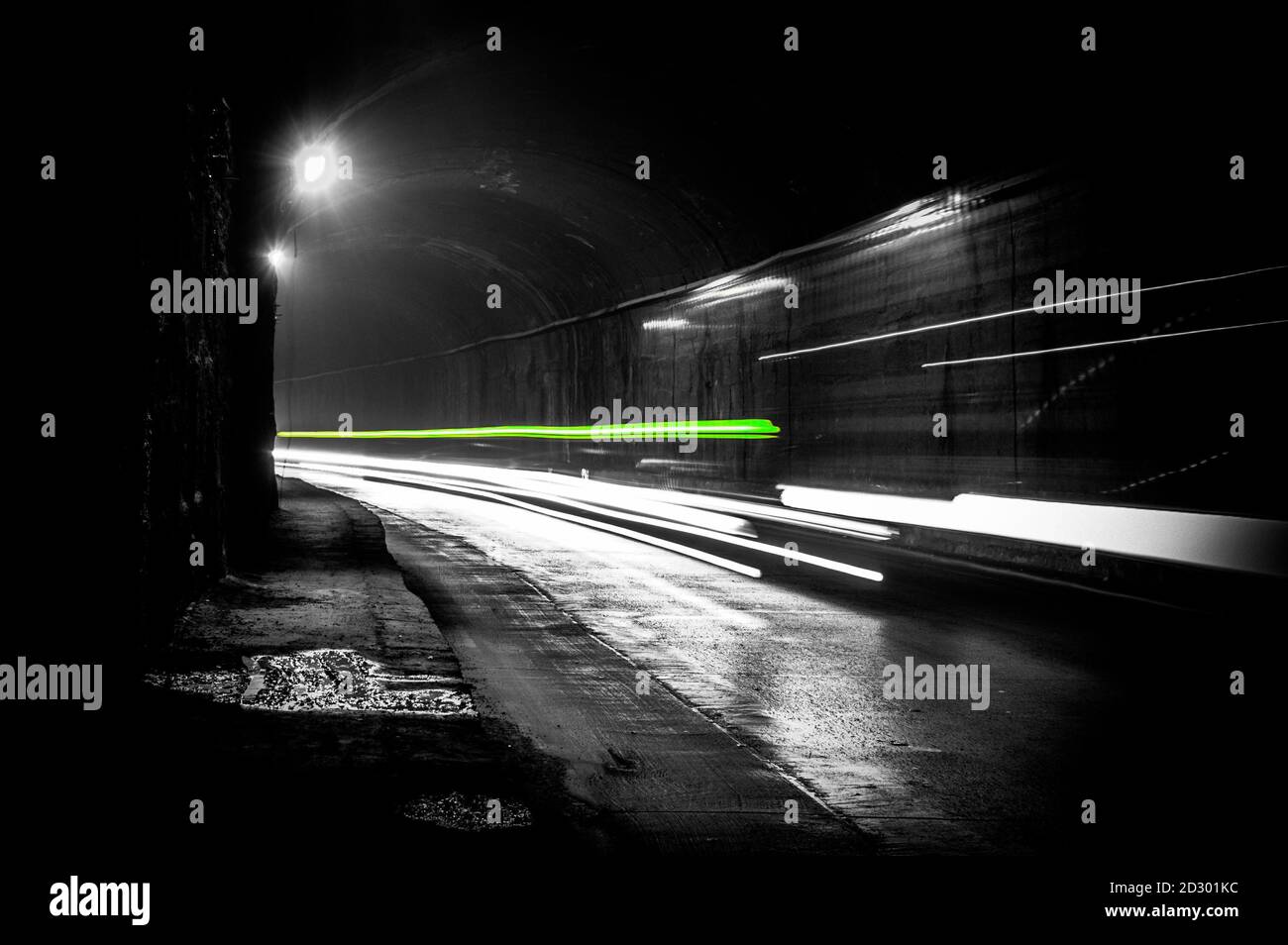 Old dark tunnel with colorful trails of light Stock Photo - Alamy