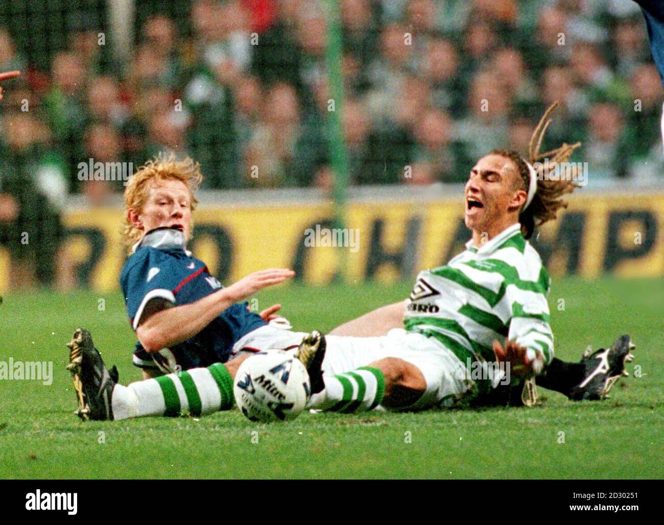 Ranger's Colin Hendry (left) and Celtic's Henrik Larsson during their ...
