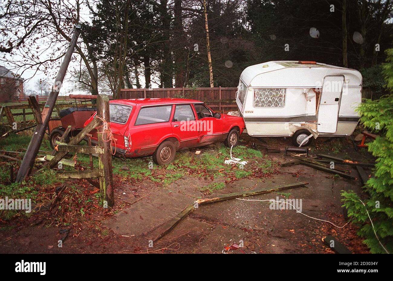 A car and a caravan which were damaged after a tractor was driven on ...