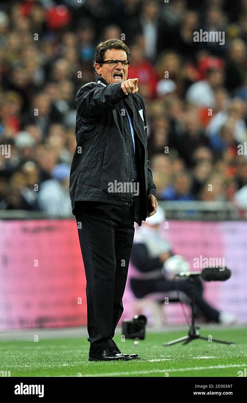 England manager Fabio Capello shouts instructions on the touchline ...
