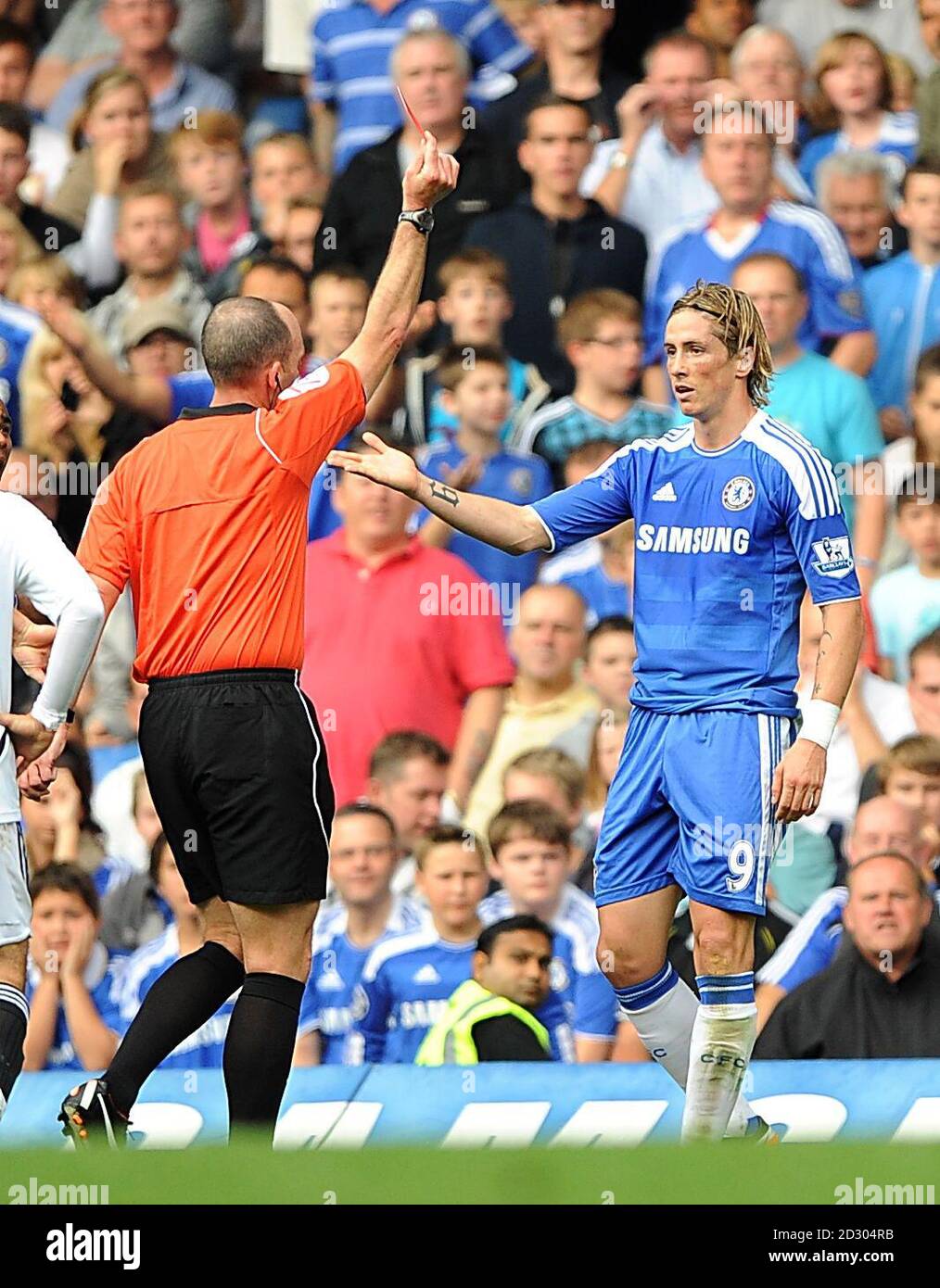 Chelsea's Fernando Torres (right) is sent-off by match referee Mike ...
