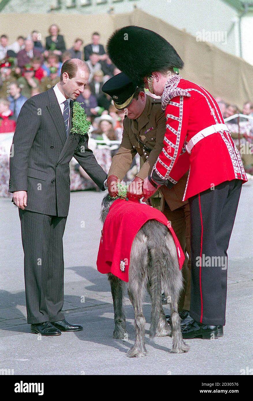 Prince Edward (left) presents Colin, the Irish wolfhound mascot, of the ...