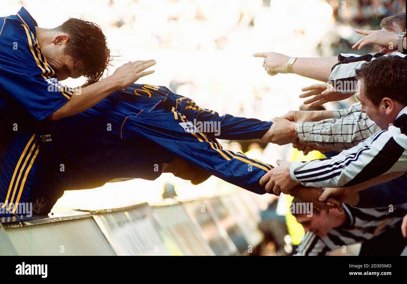 Newcastle fans reach out hi-res stock photography and images - Alamy