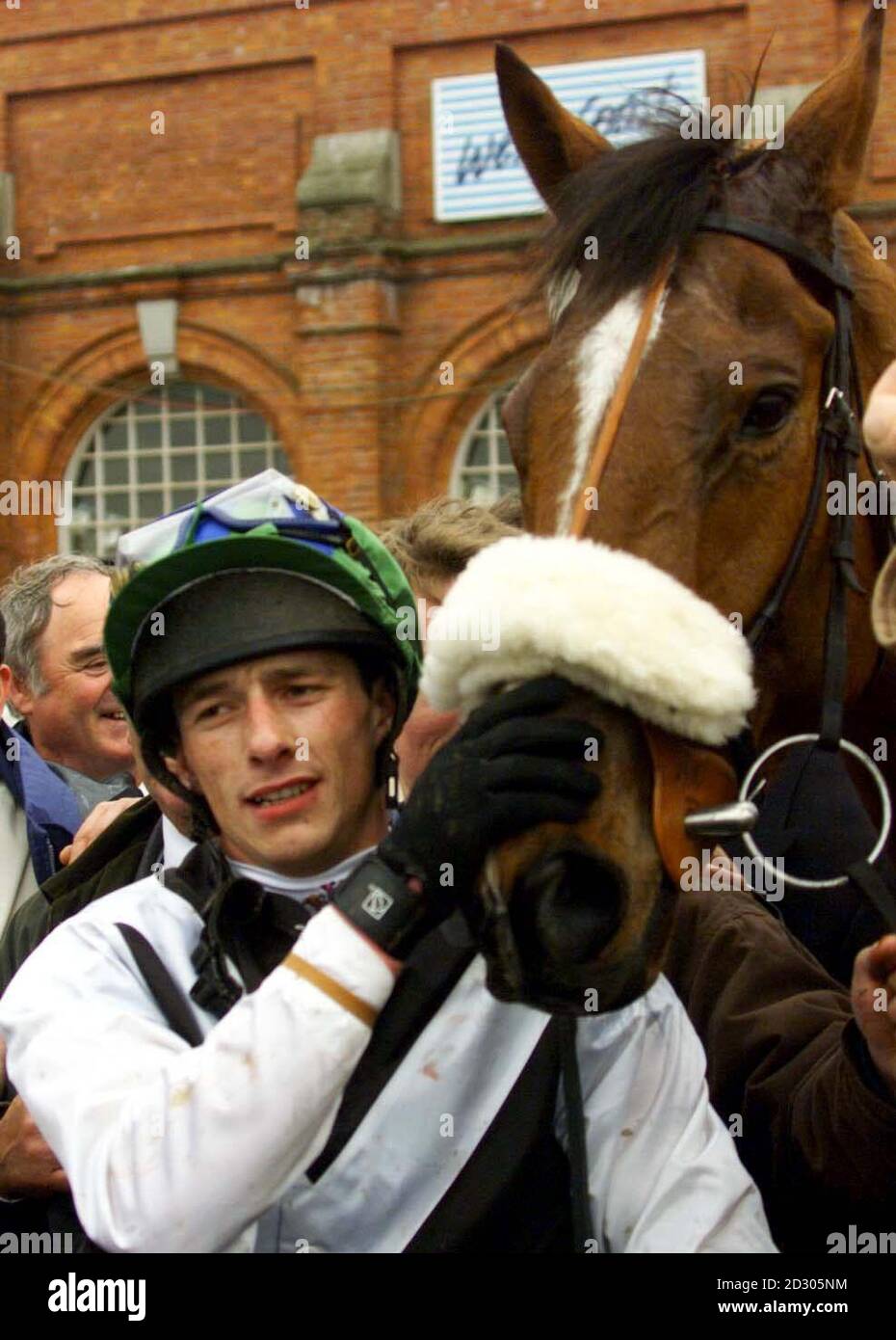 Jockey Tom Rudd with Glebe Lad after winning the Irish Grand National ...