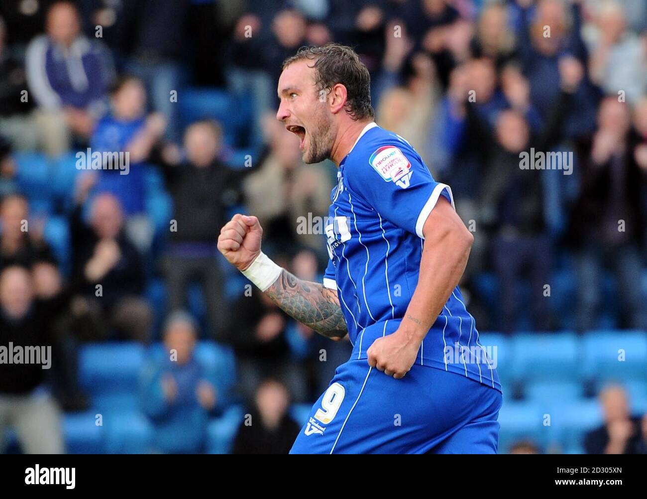 Gillingham's Danny Kedwell celebrates scoring from the penalty spot ...
