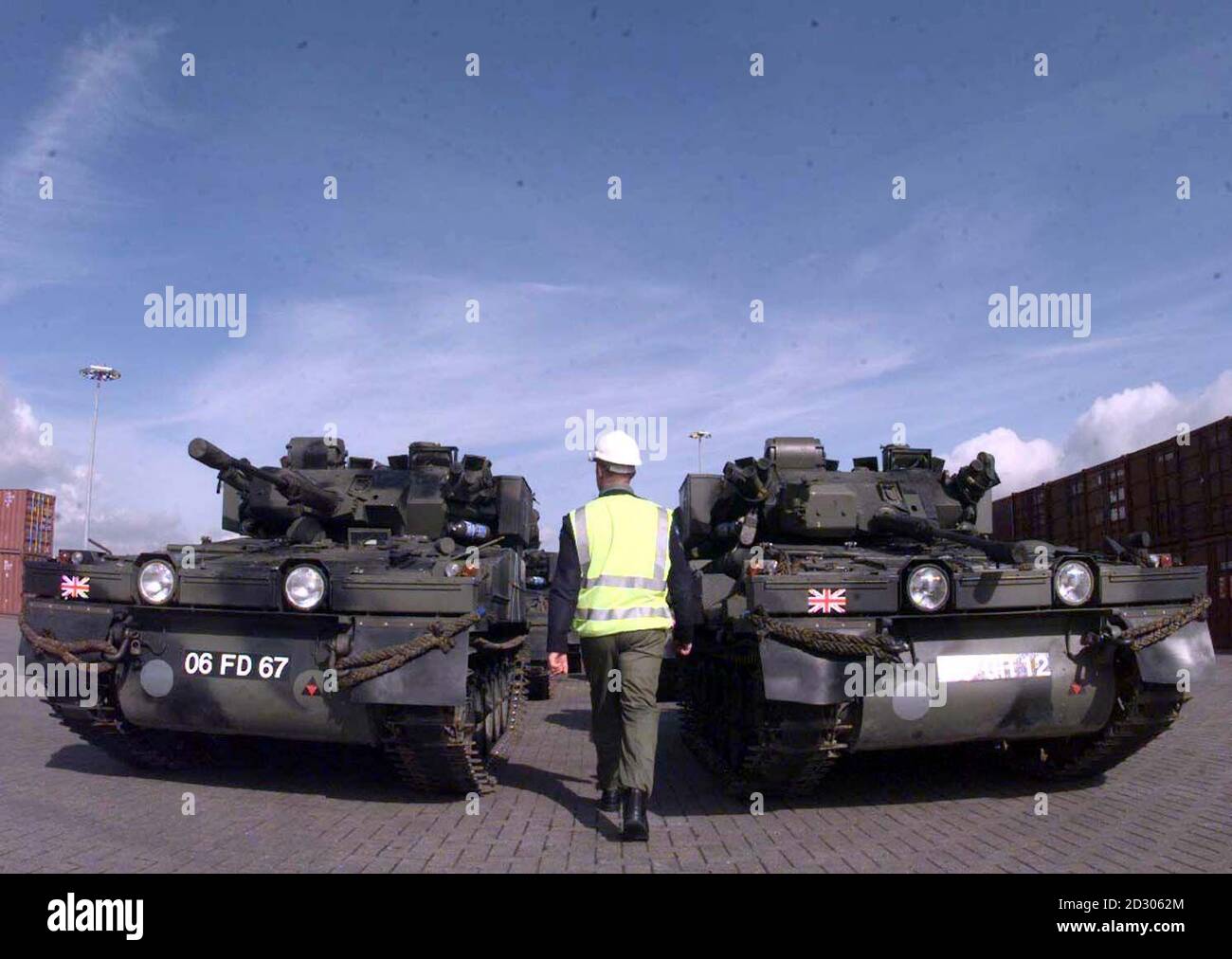 British Army vehicles including Scimitars (pictured), are loaded onto ...
