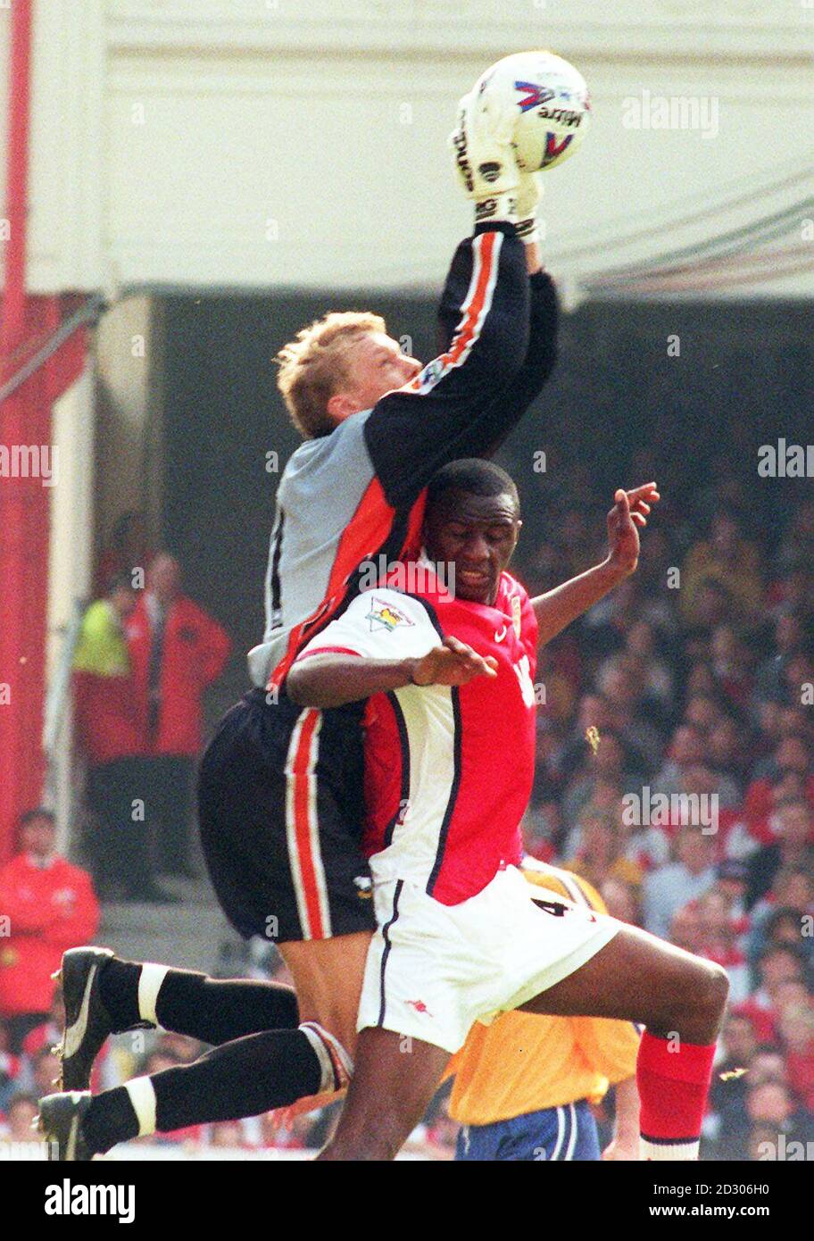 Football full length ball catching catches hi-res stock photography and ...