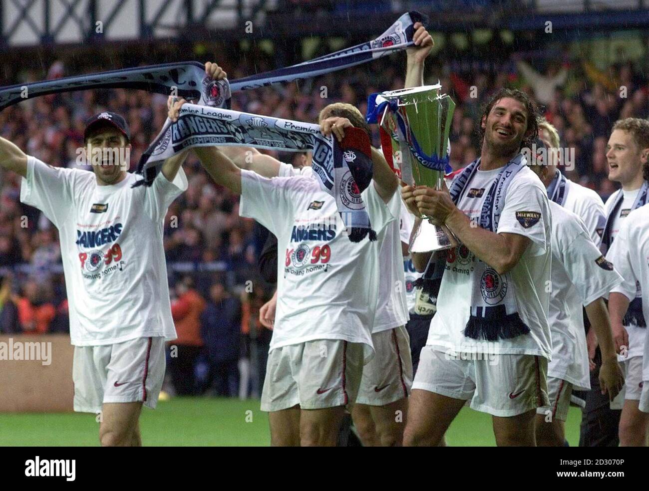 Rangers lorenzo amoruso leads team around pitch ibrox stadium glasgow ...