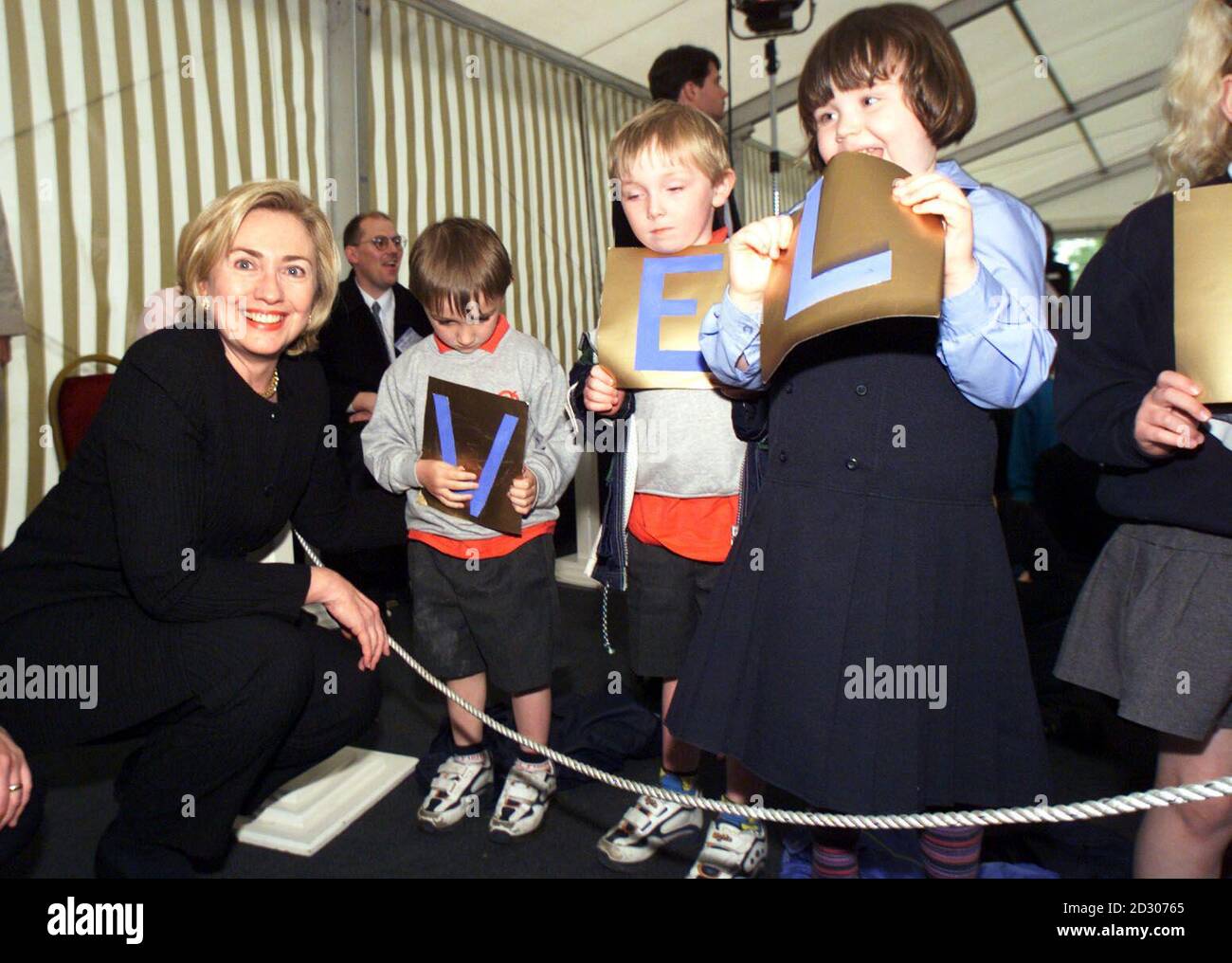 U.S. First Lady Hillary Clinton with shy pupils at the offical launch ...