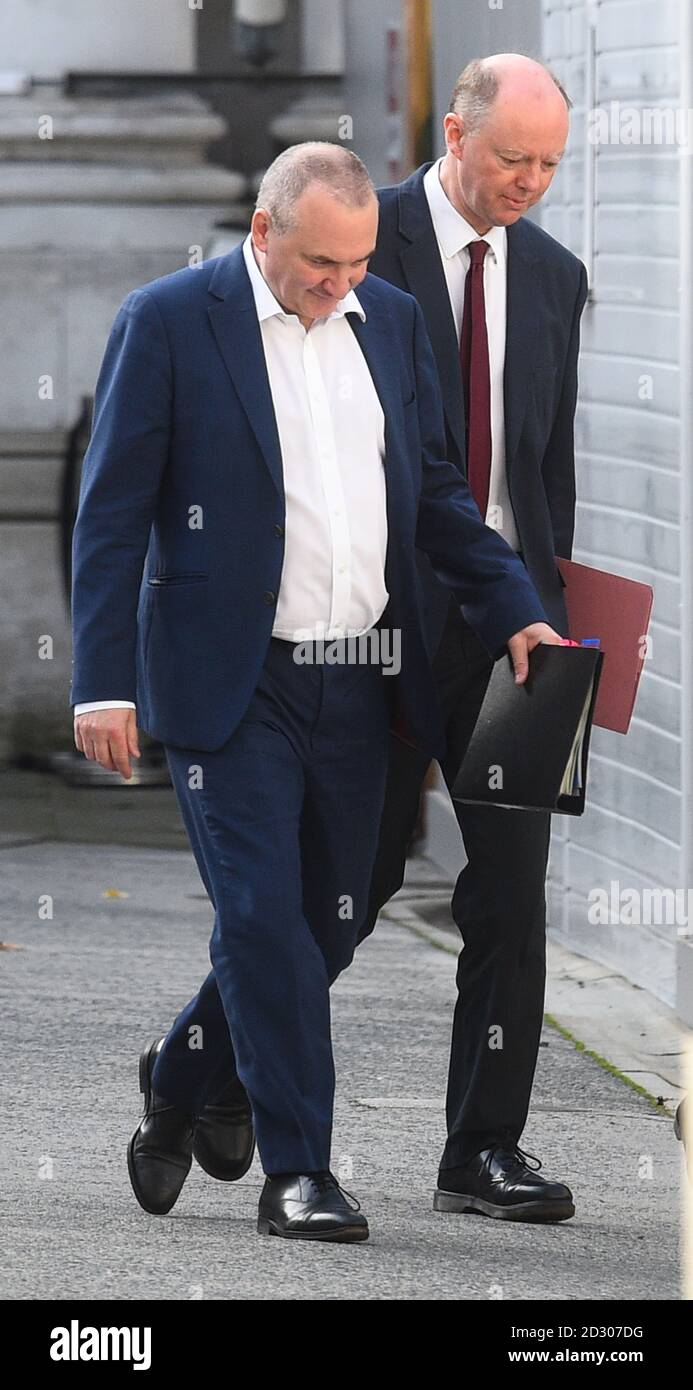 Chief Medical Officer, Professor Chris Whitty (right) walks through the ...
