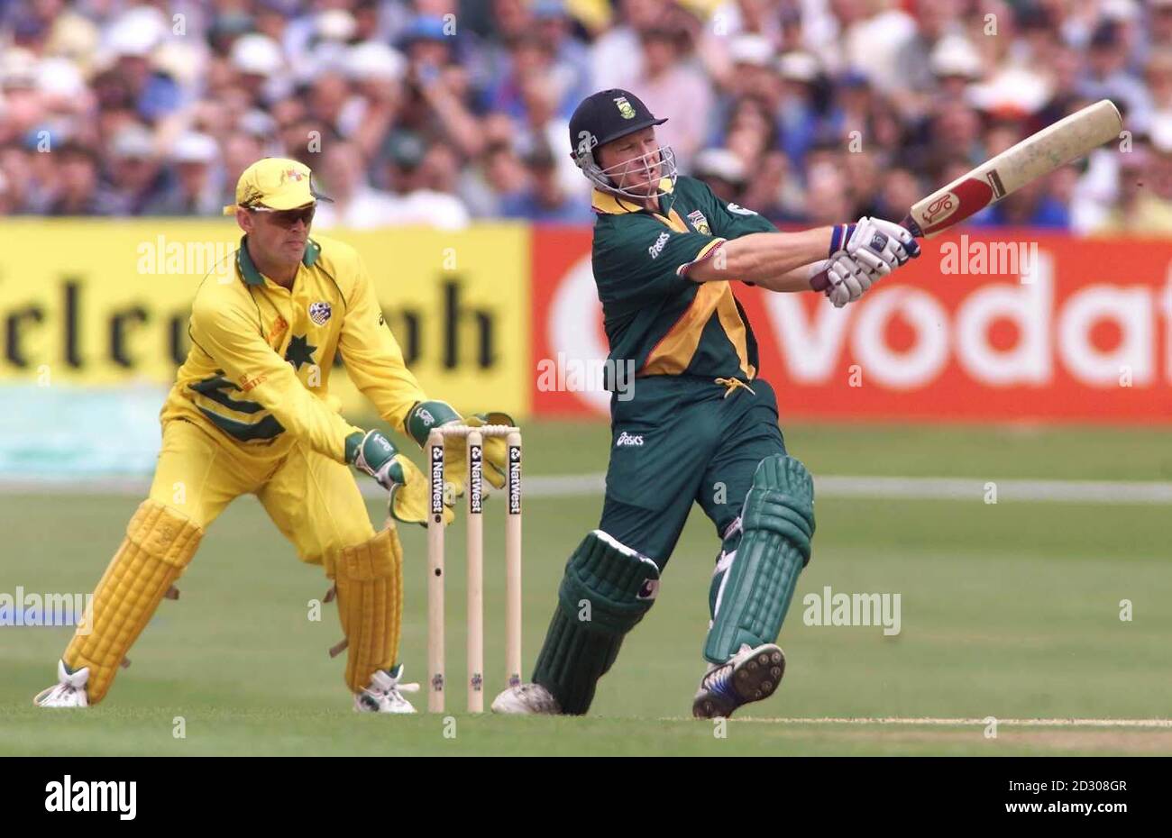 South africas darryl cullinan hits ball six against australia hi-res ...