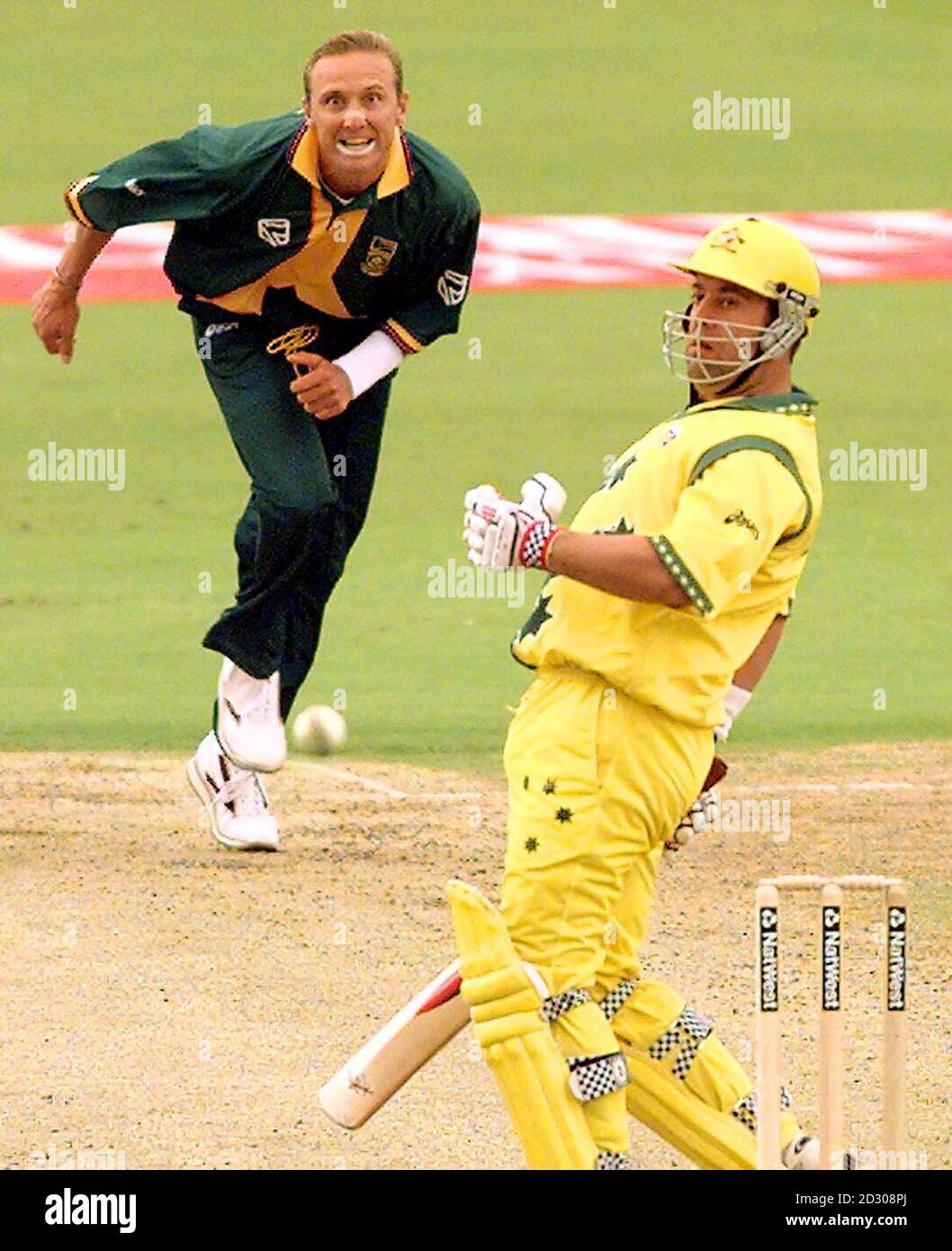 South Africa's Allan Donald closes in as he watches the ball from ...