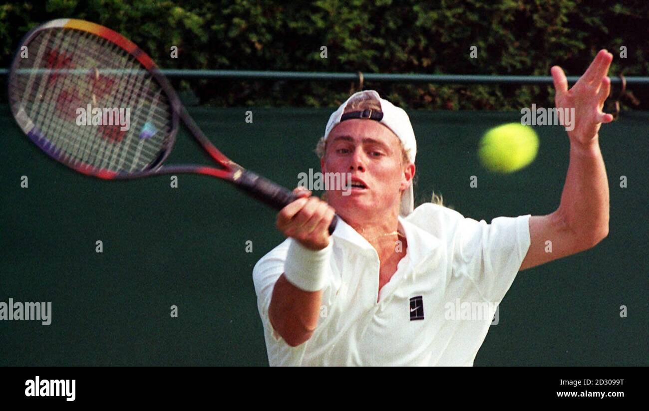 No commercial use. Lleyton Hewitt in action against Karim Alami, during ...