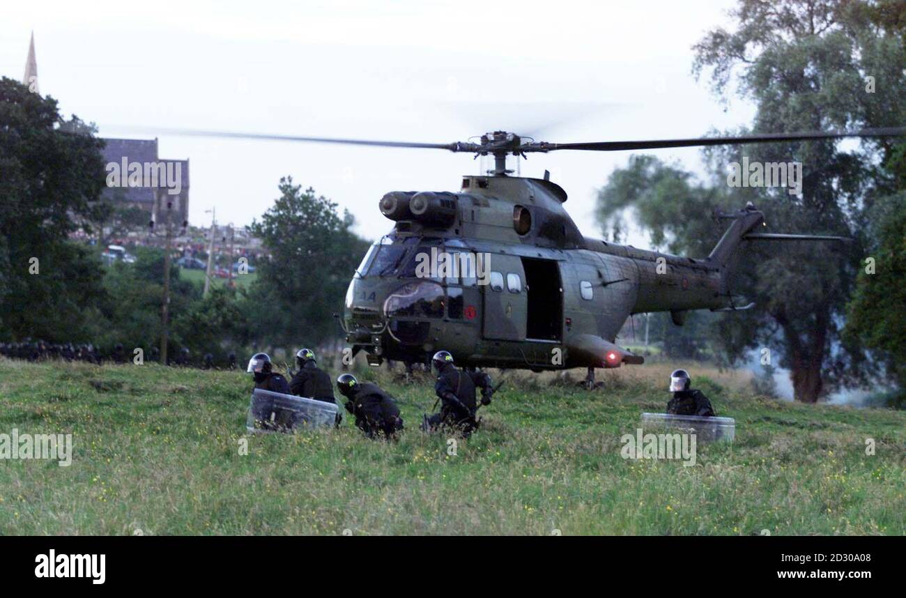An army helicopter drops riot police near drumcree church hi-res stock ...