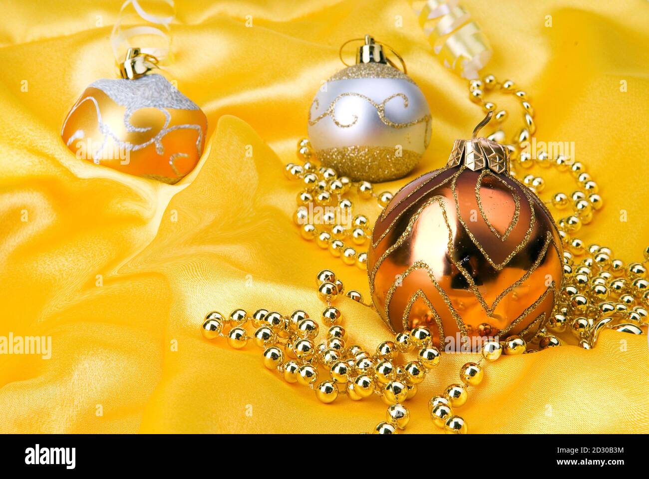 Christmas yellow background with golden christmas decorations Stock ...