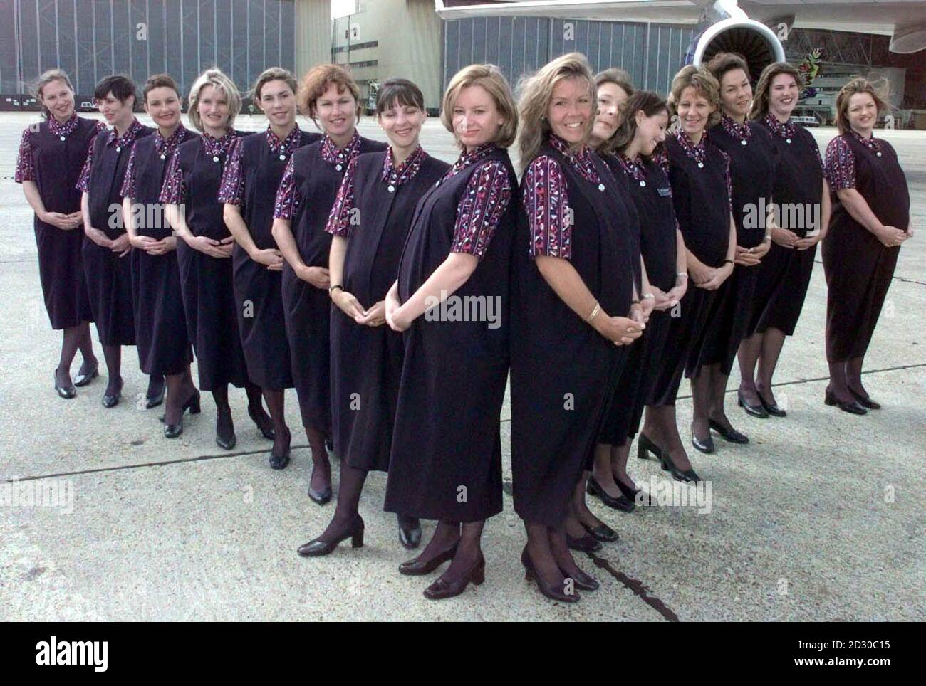 Show off their fuller figures at heathrow airport hi-res stock ...