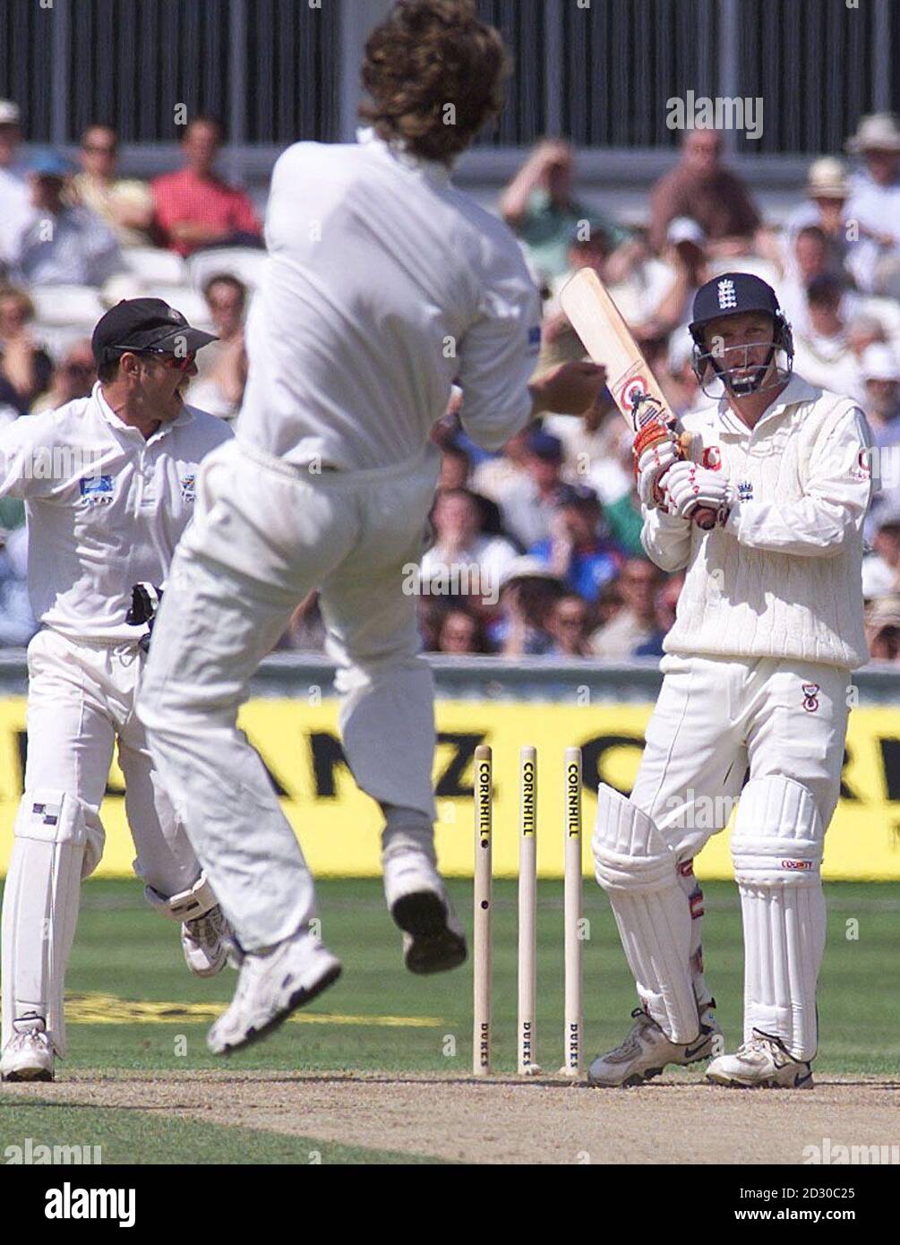 England's Darren Maddy is bowled by New Zealand's Daniel Vettori ...