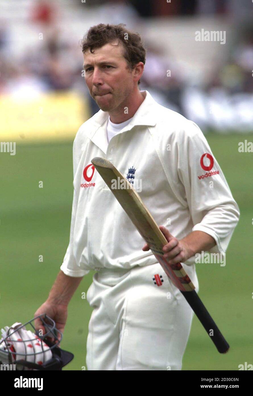 England's Michael Atherton walks back to the pavilion, during the ...