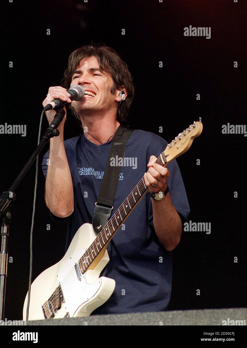 Performing on stage at the 1999 reading music festival hi-res stock ...
