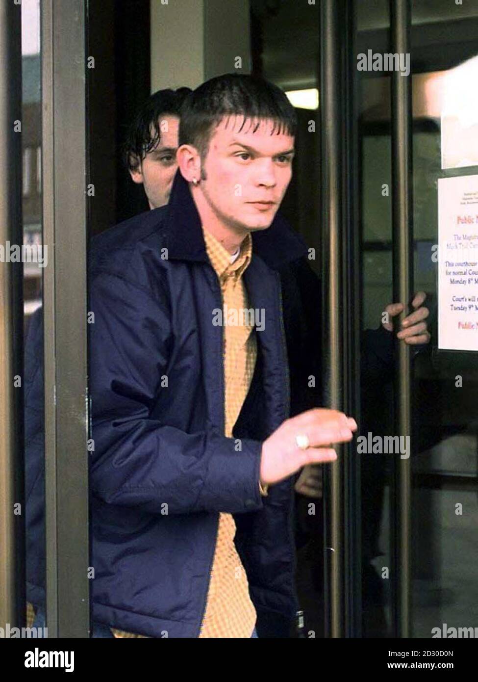 James Alexander McKinnon (background) and Stephen Gerald Cornes leaving ...