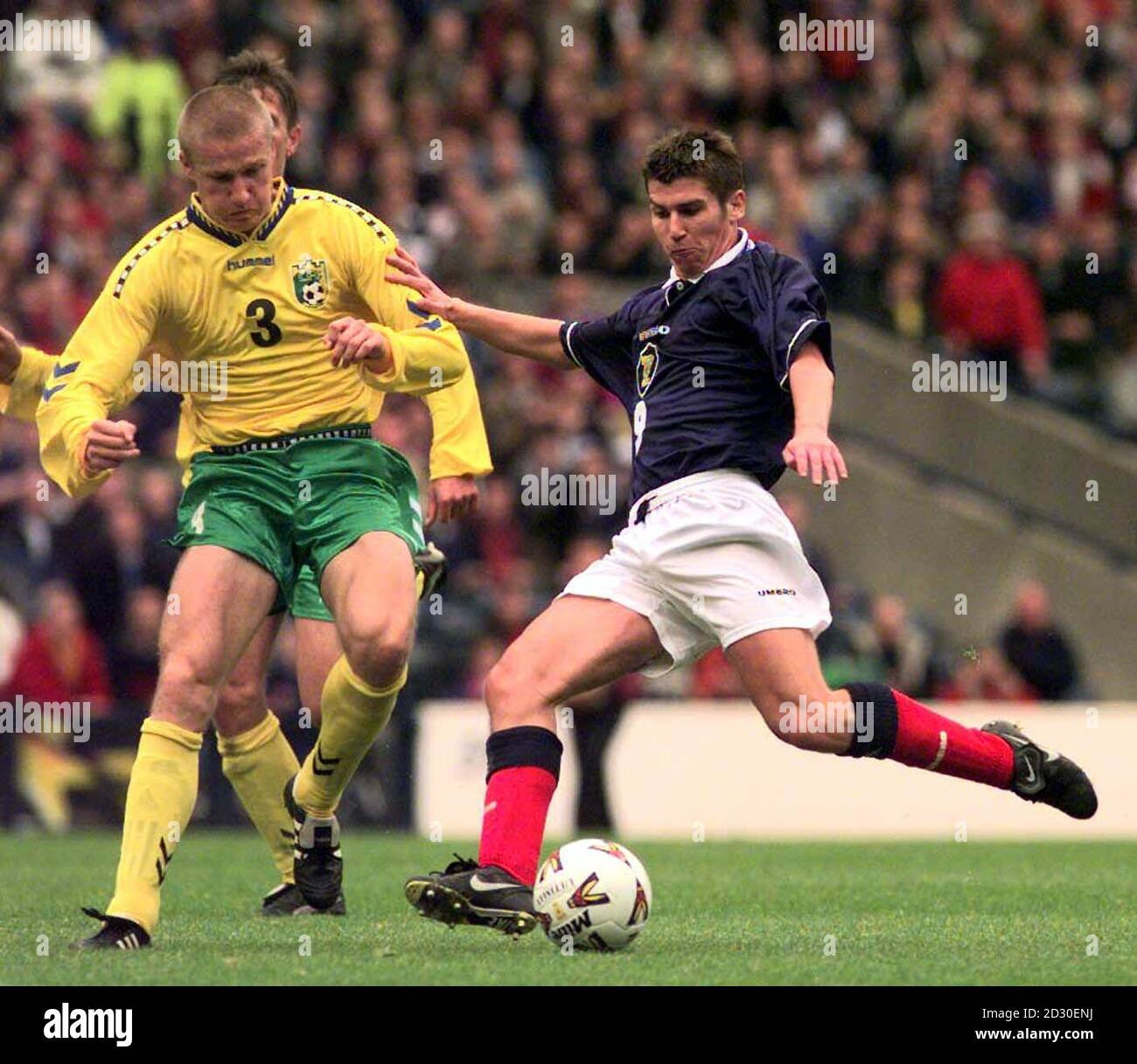 Scotland`s Mark Burchill takes a shot at the Lithuanian goal in their ...
