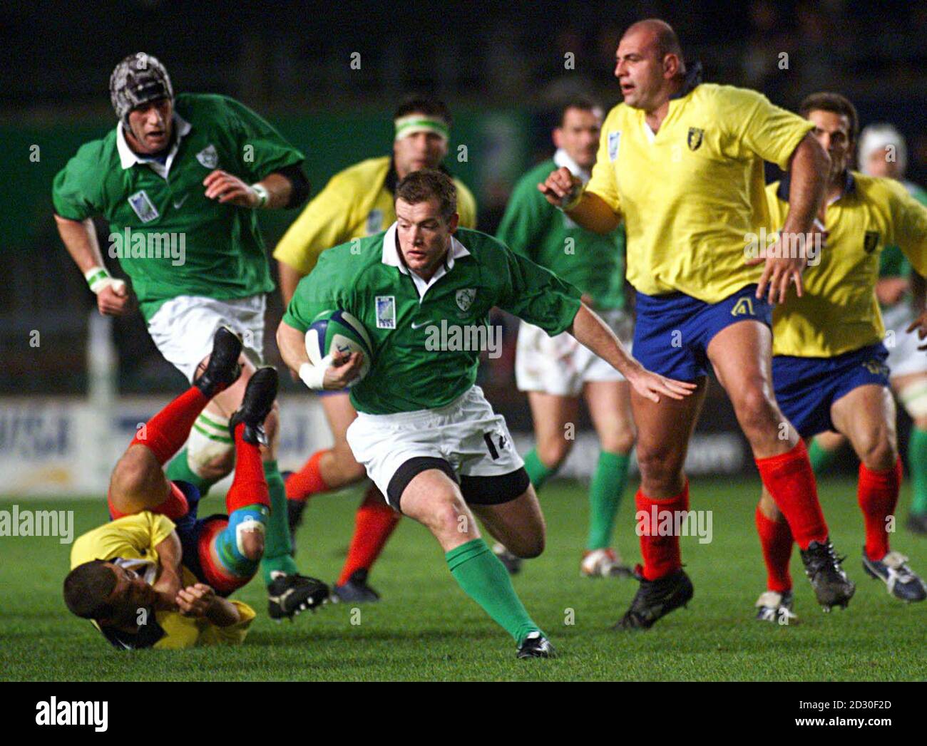 Ireland's James Topping (centre) makes a break against Romania during ...