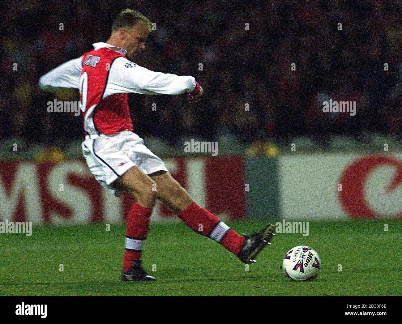 Dennis berkamp arsenal scores against barcelona hi-res stock ...