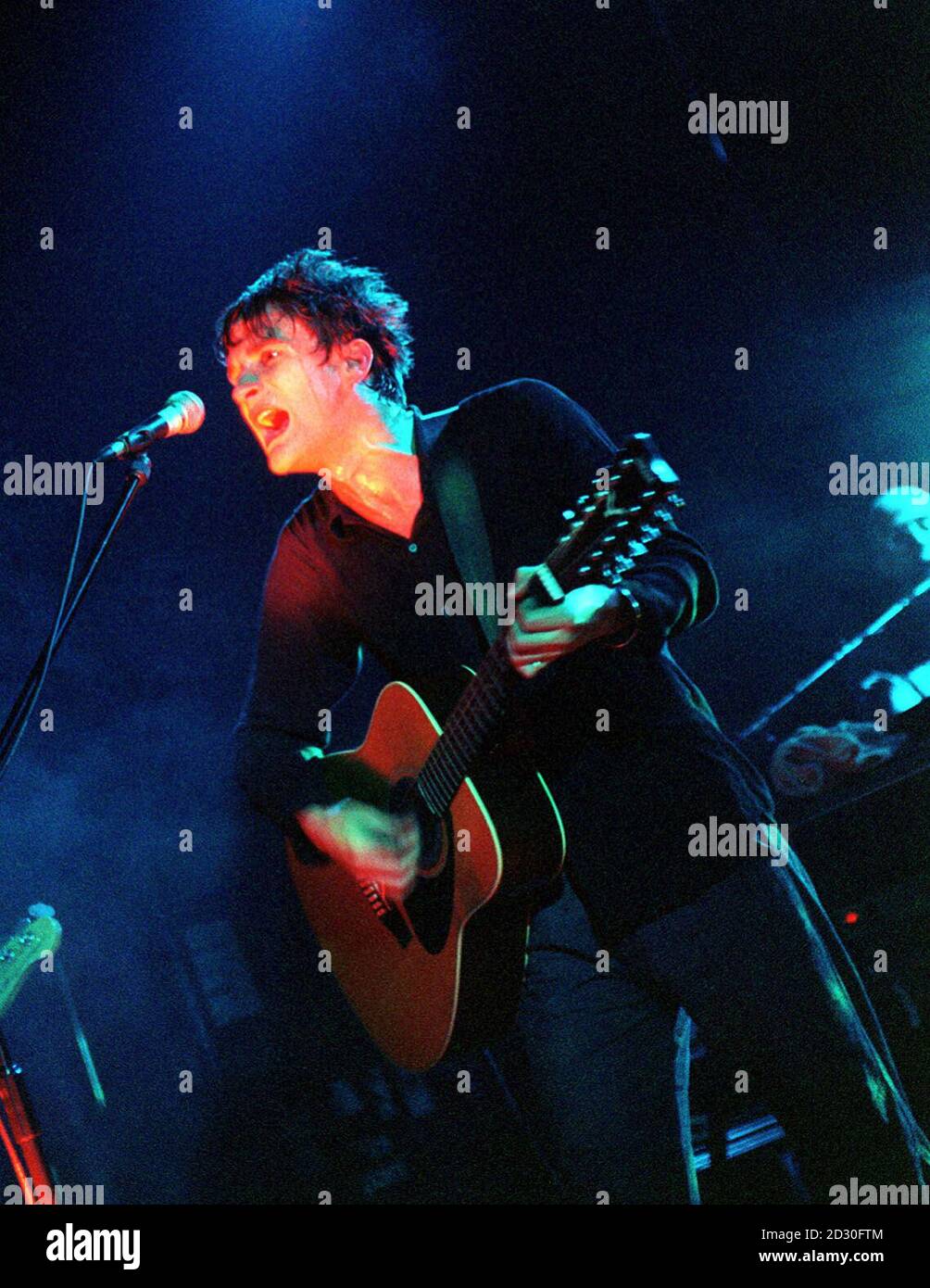 Crispin Hunt, lead singer of the rock group the Longpigs performing on ...