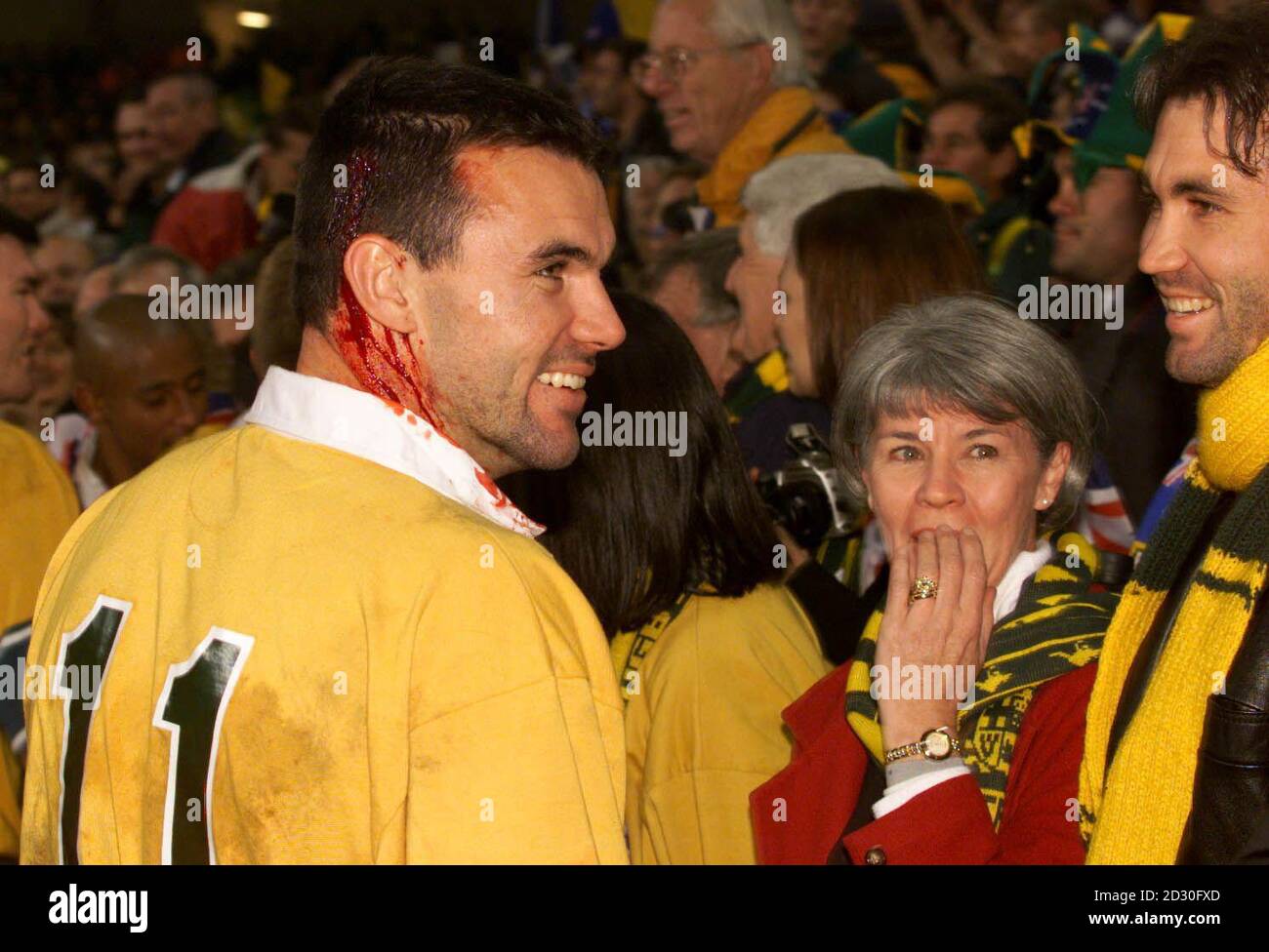Australia's bloodied Joe Roff chats to fans after his team's 35-12 ...