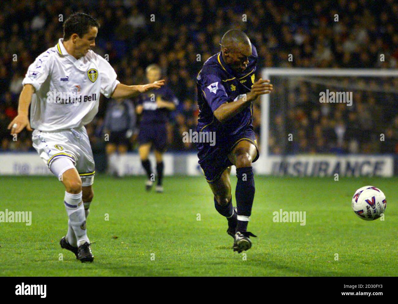 Leeds United's Gary Kelly keeps a close eye on Wimbledon 's Marcus ...