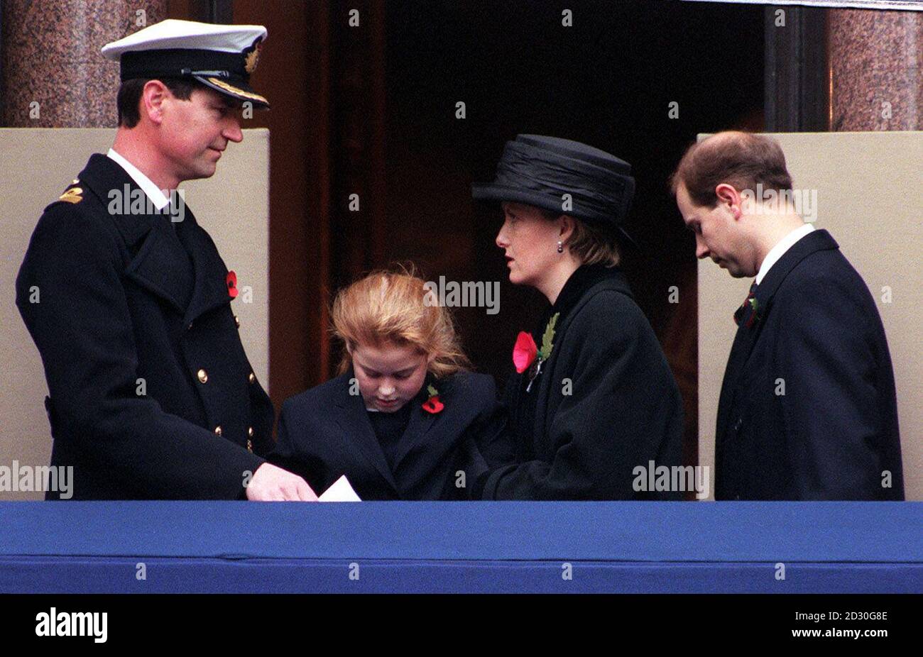 Princess Beatrice, daughter of the Duke and Duchess of York, is helped ...