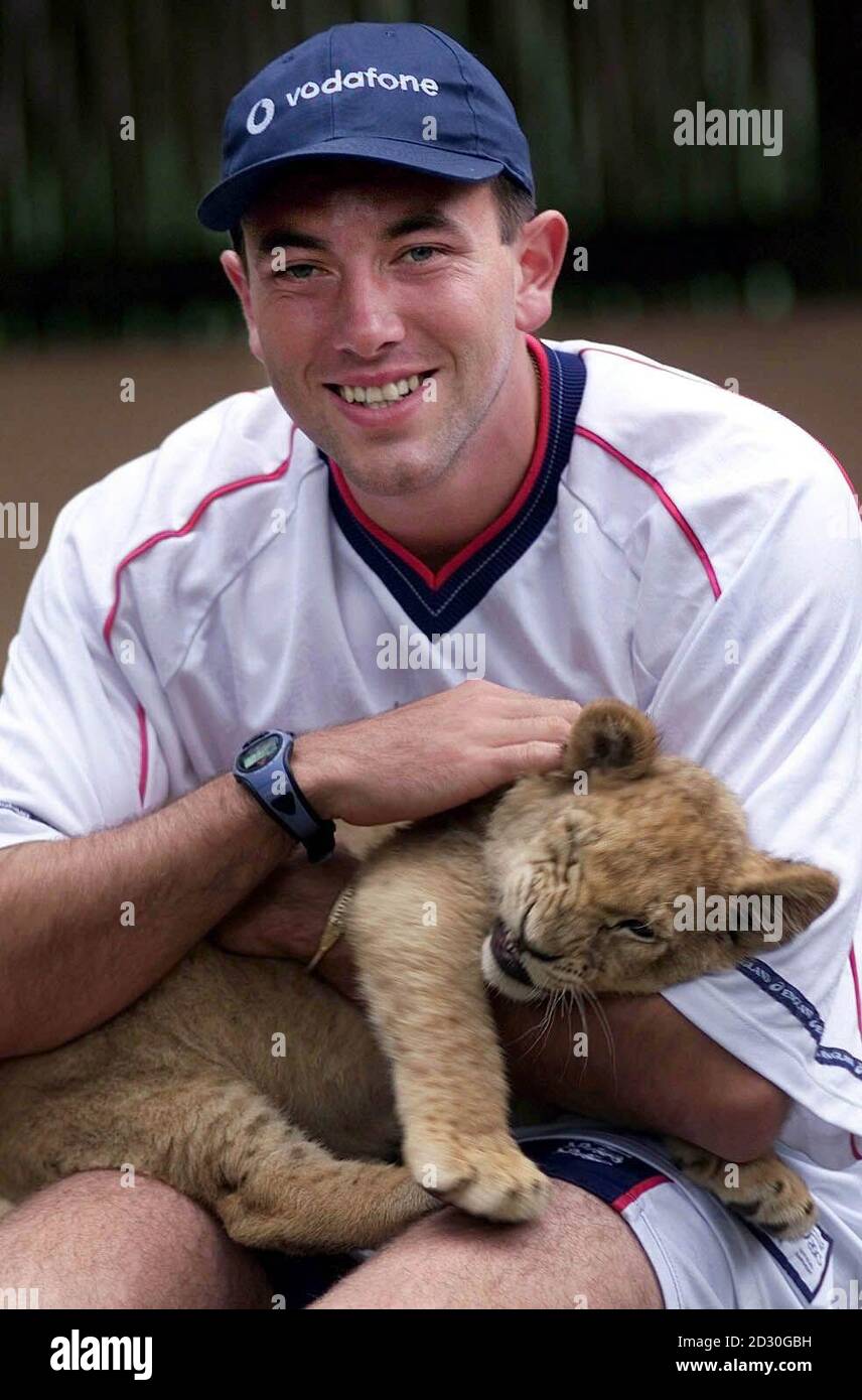 England Cricket bowler Chris Silverwood holds a lion cub at The Lion ...