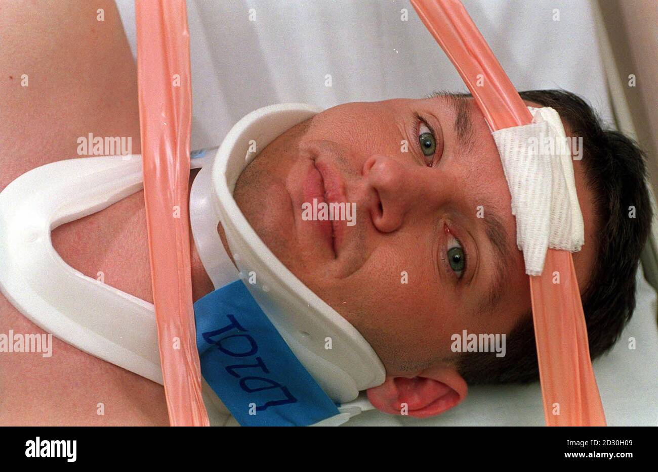 Suspected spinal injury when he hit over head by hi-res stock ...