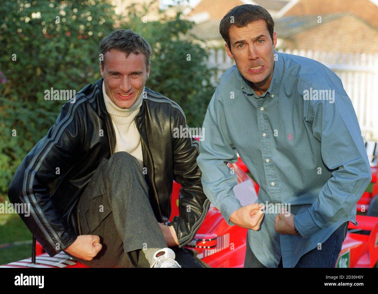 Formula One racing driver Eddie Irvine with Big Breakfast television ...