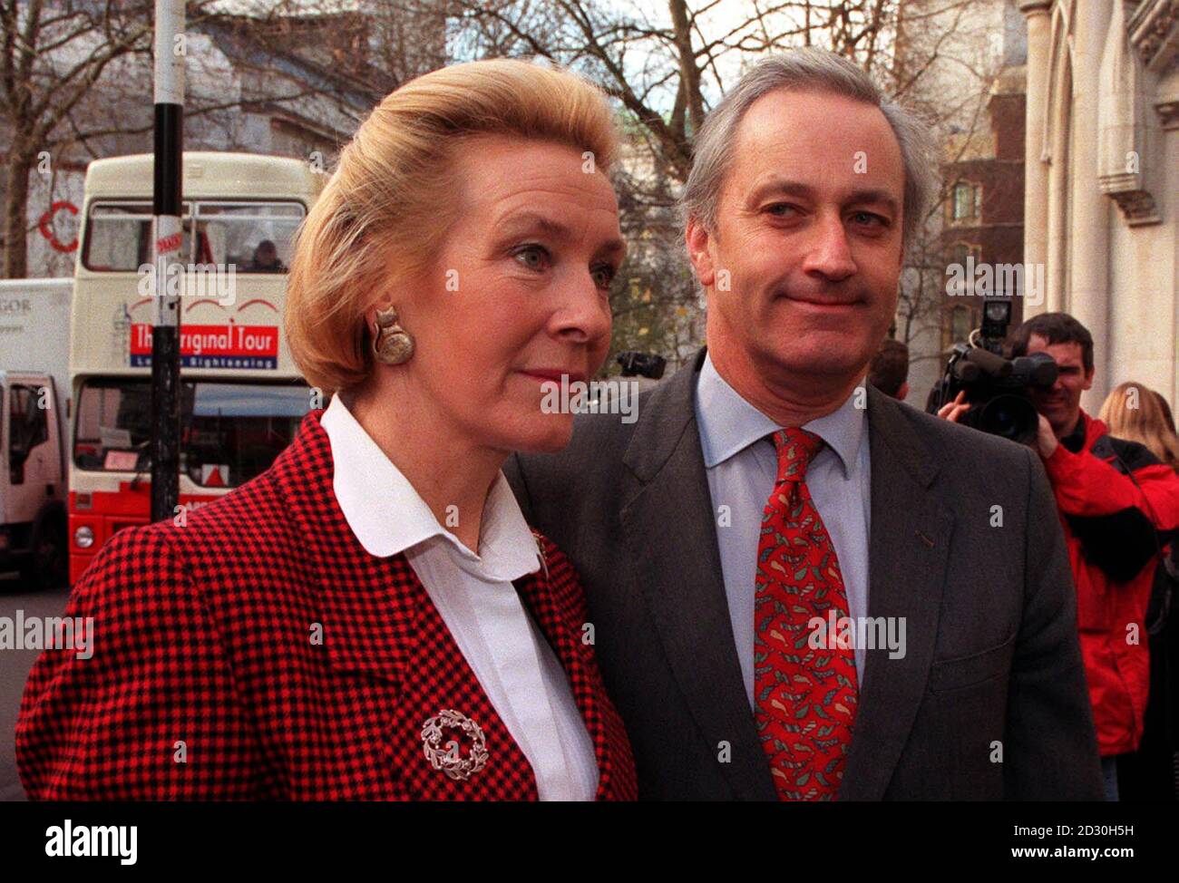 Former Tory minister Neil Hamilton and his wife Christine arriving at ...